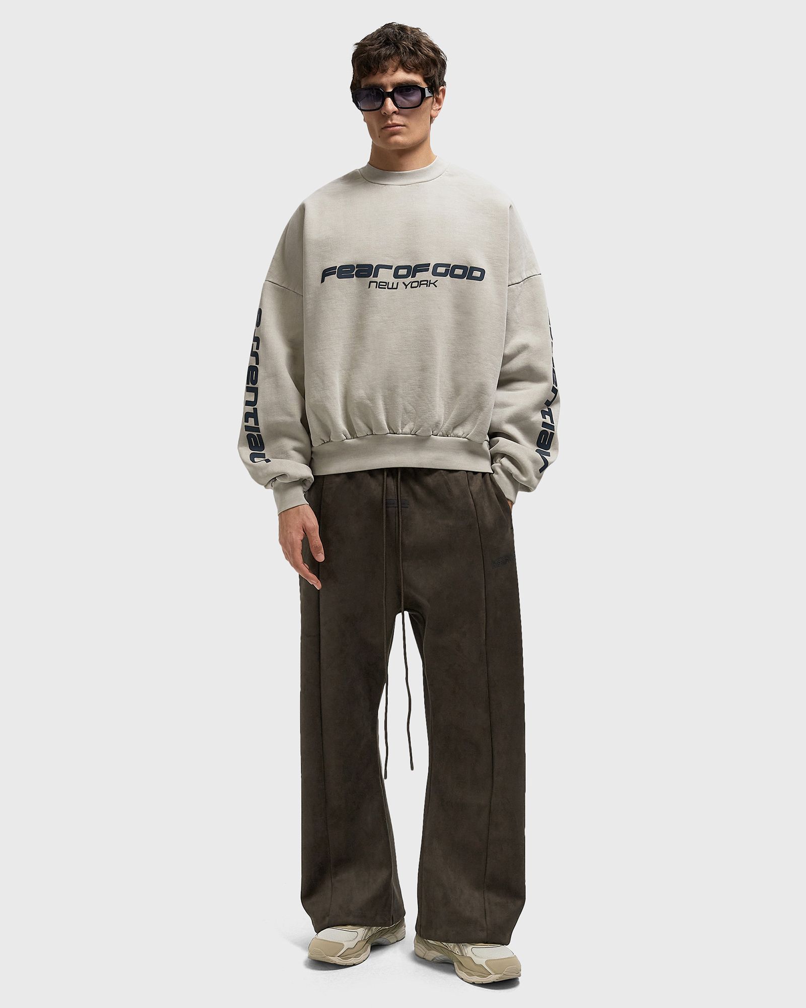 Fear of God Essentials FLARE PANT Brown | BSTN Store