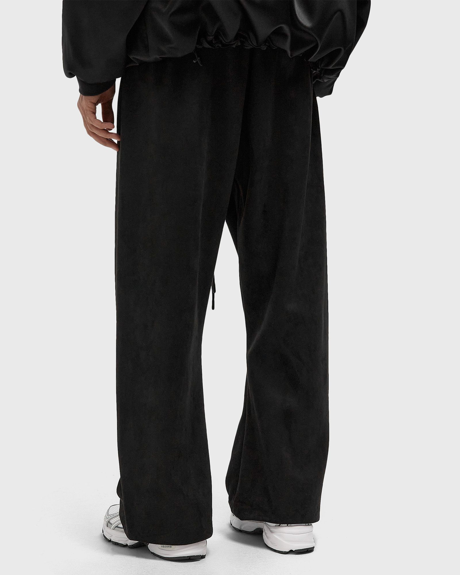 Fear of God Essentials FLARE PANT Black | BSTN Store