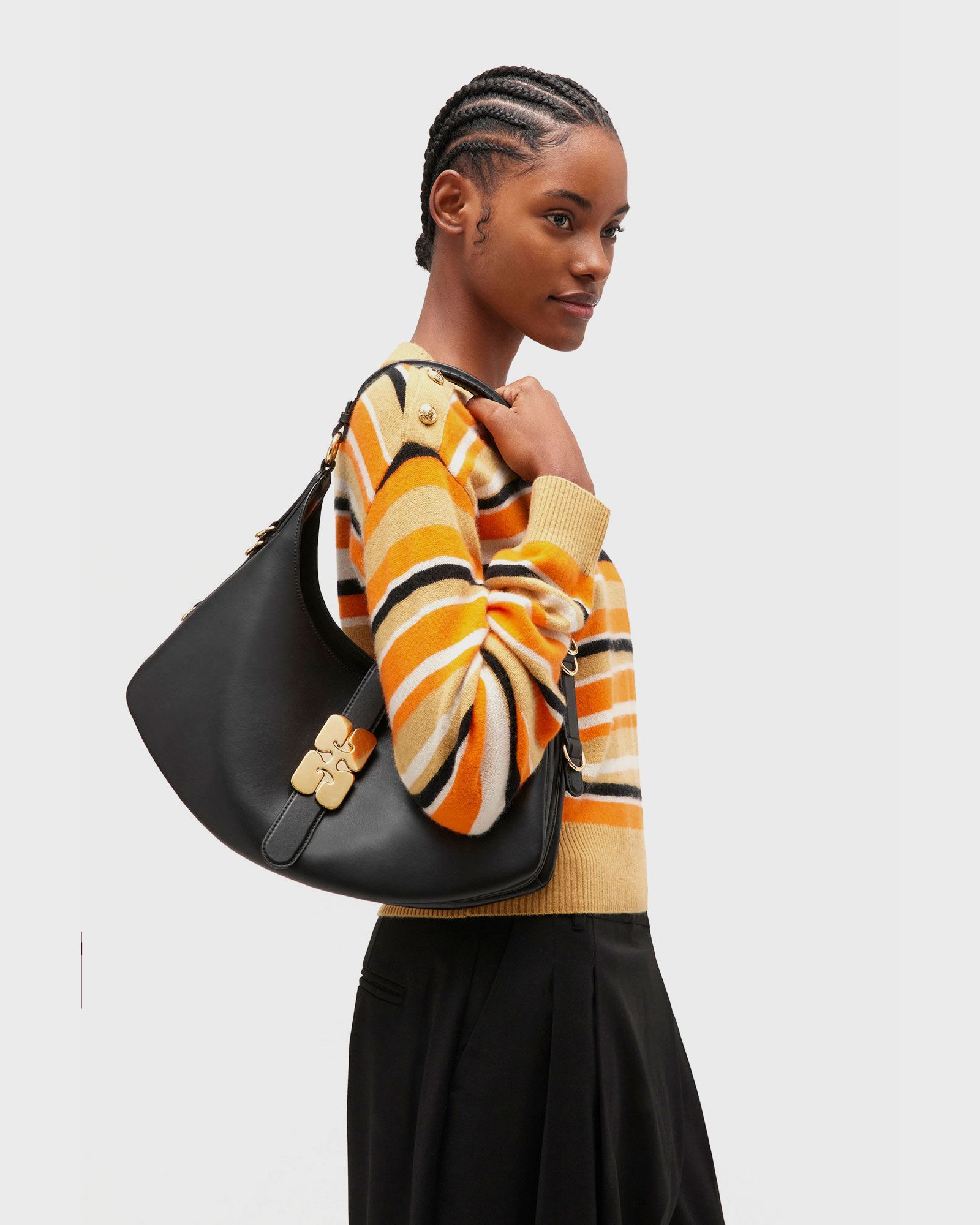 Ganni Kat Small Gold Black | BSTN Store