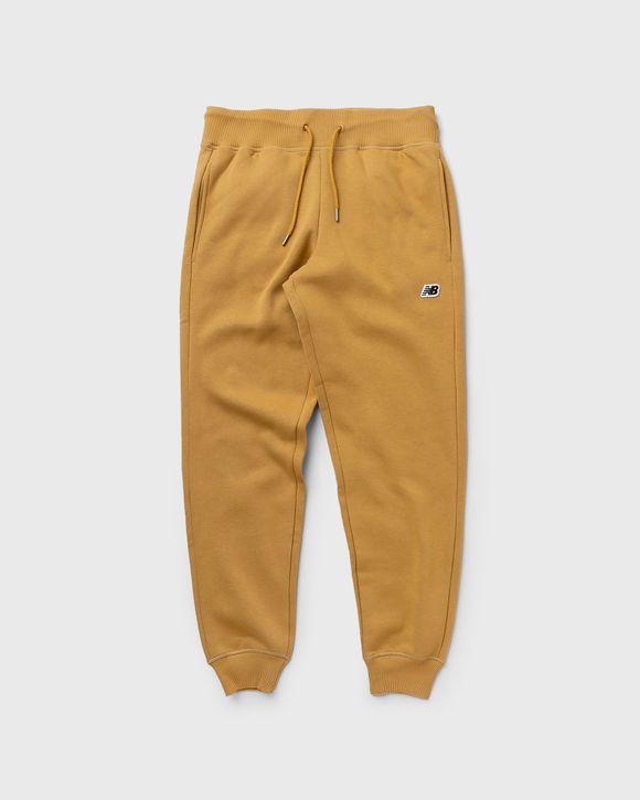 New Balance Small Logo Pant Yellow | BSTN Store